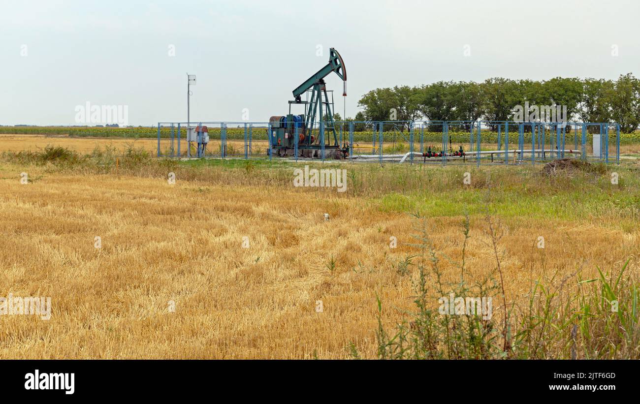 Pumping Oil Well Pump Jack at Agriculture Field Pumpjack Stock Photo ...