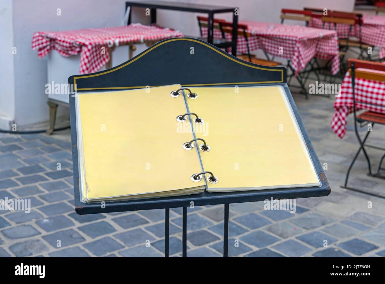 Open Restaurant Menu at Free Standing Holder Copy Space Stock Photo - Alamy