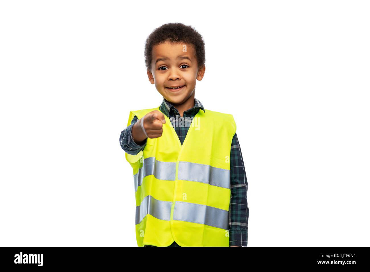 little boy in safety vest over white background Stock Photo - Alamy