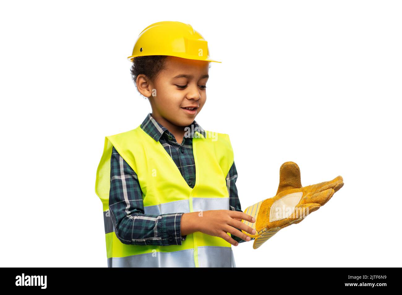little boy with glove in safety vest and helmet Stock Photo - Alamy