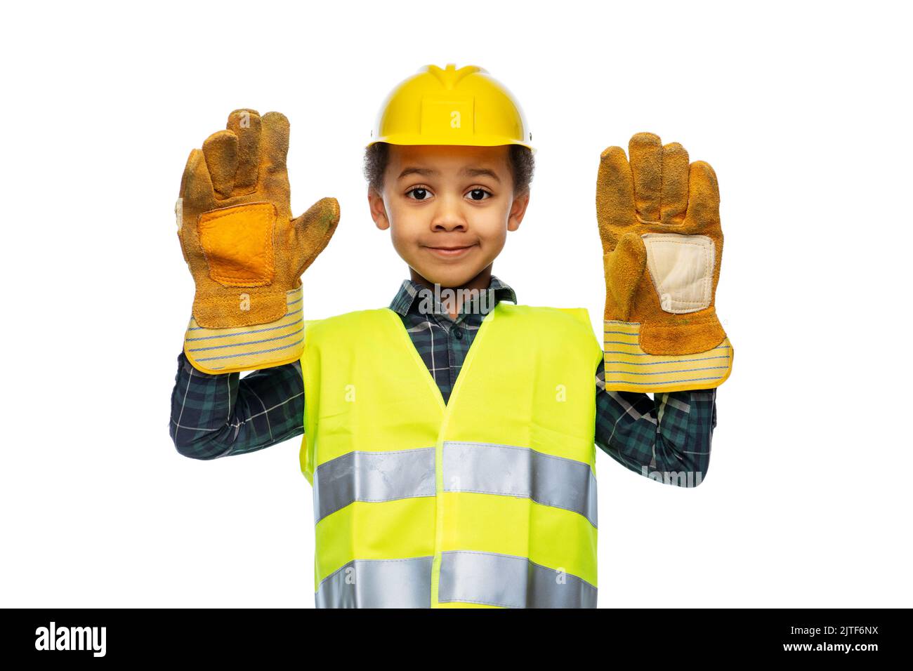 little boy in gloves, safety vest and helmet Stock Photo - Alamy