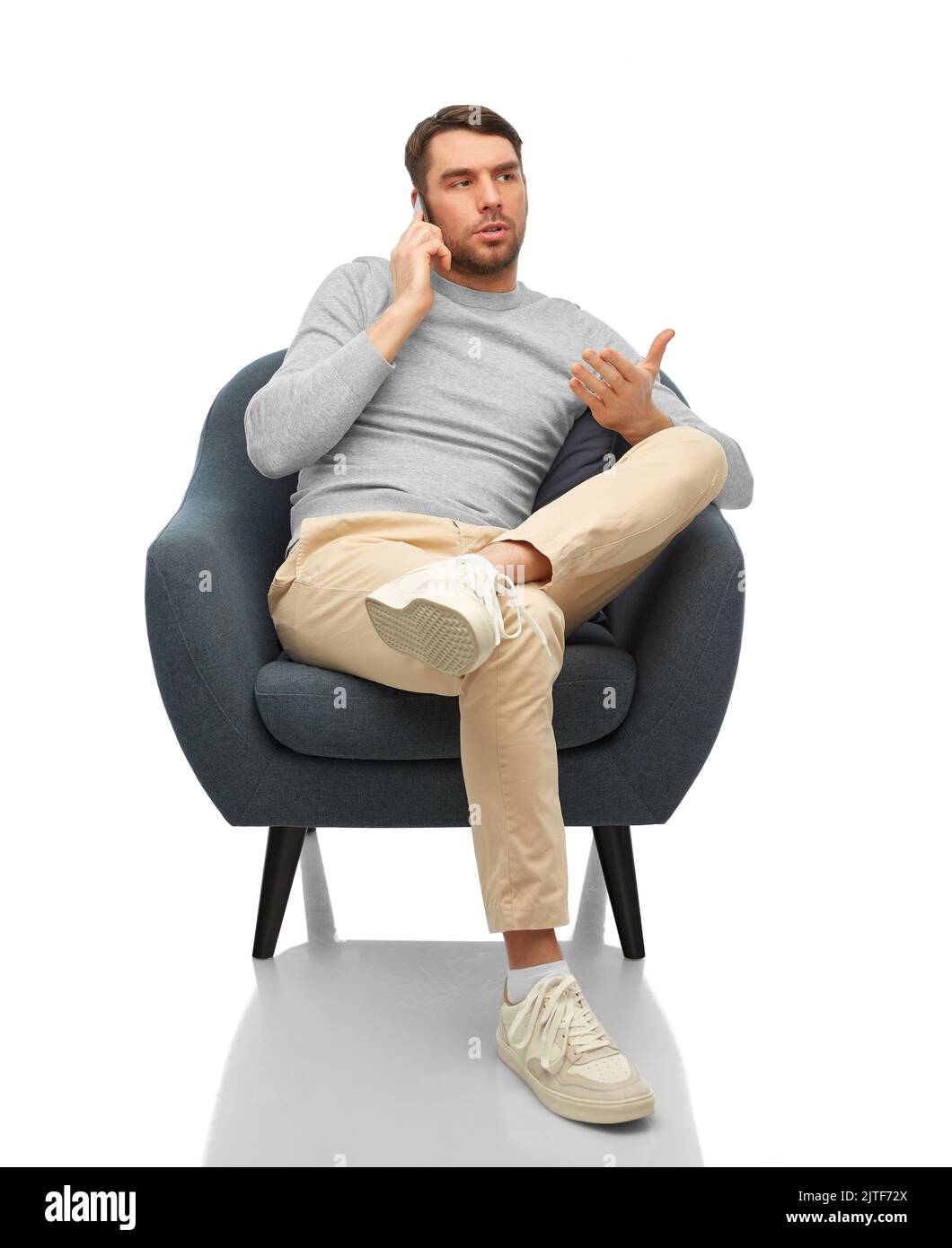 Angry hispanic man sitting in hi-res stock photography and images - Alamy