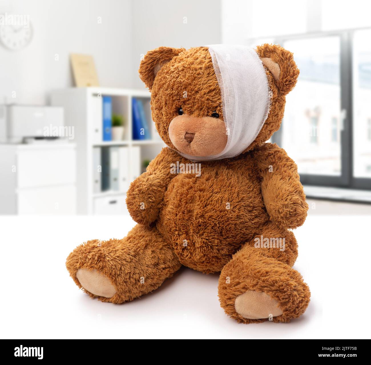 teddy bear toy with bandaged head having toothache Stock Photo - Alamy