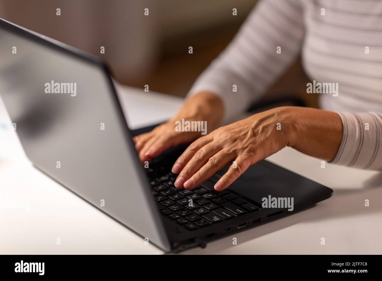 Hands elderly person typing hi-res stock photography and images - Alamy