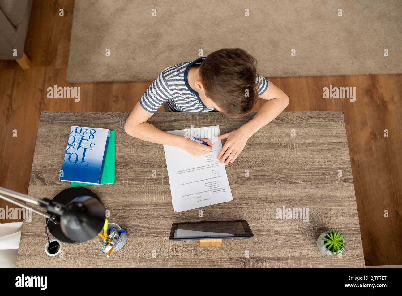 Child doing test hi-res stock photography and images - Alamy