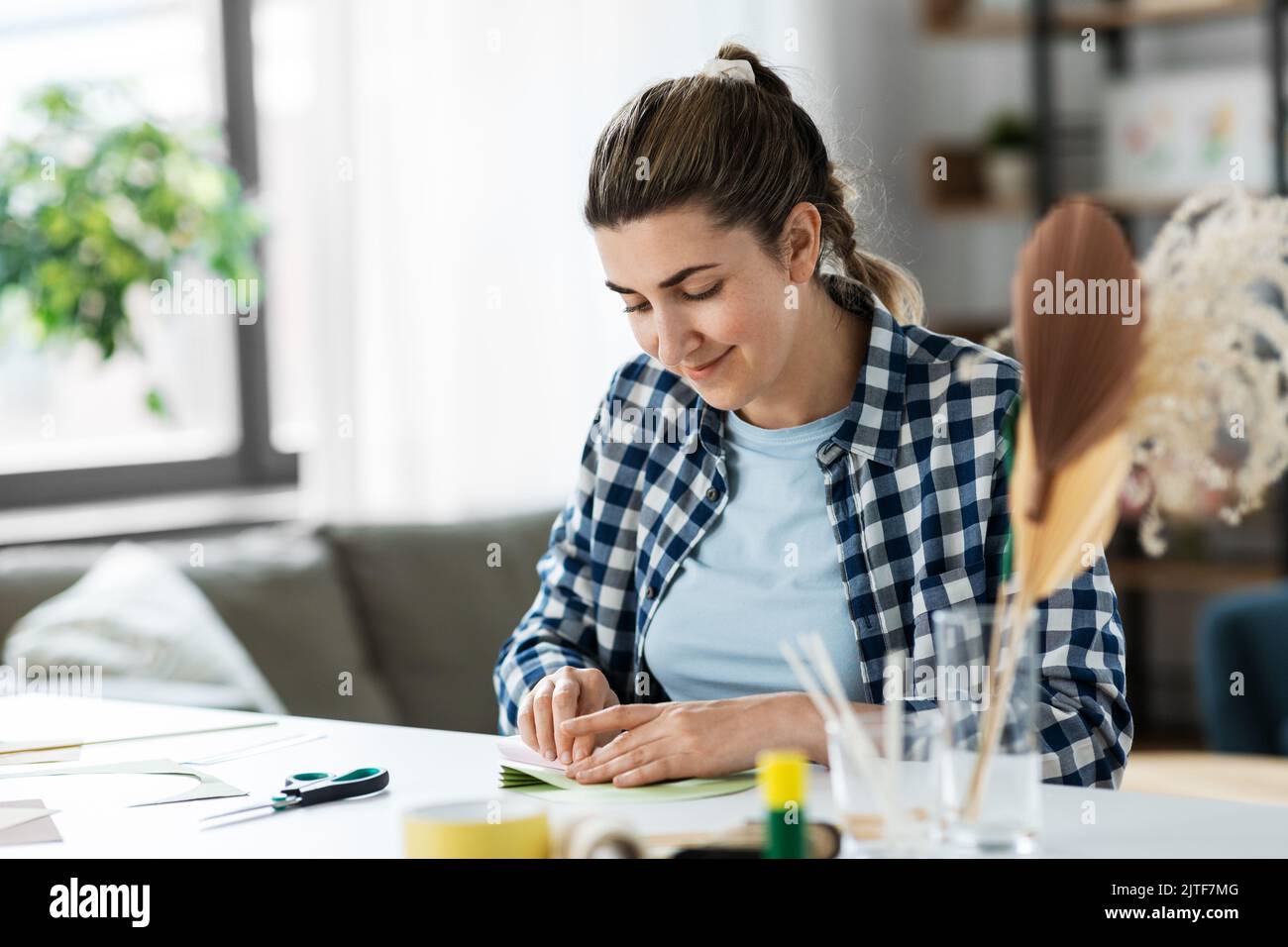 woman making paper craft at home Stock Photo - Alamy