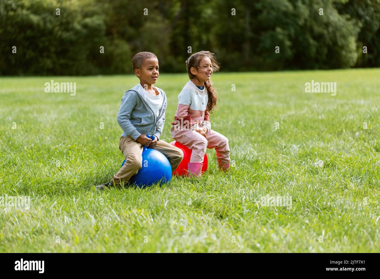 Children bouncing balls hi-res stock photography and images - Alamy