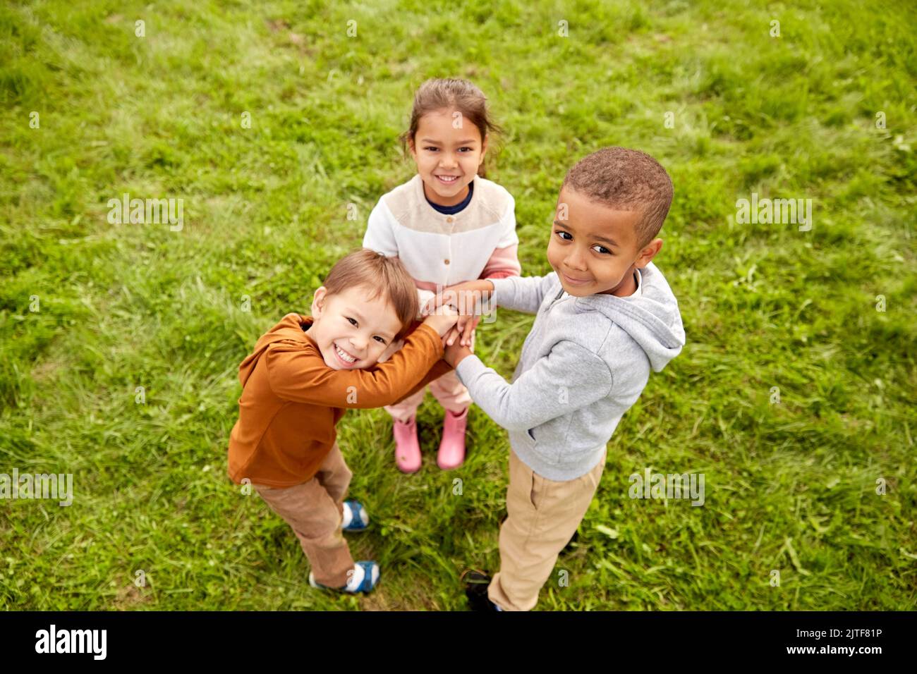 group of children playing game at park Stock Photo - Alamy