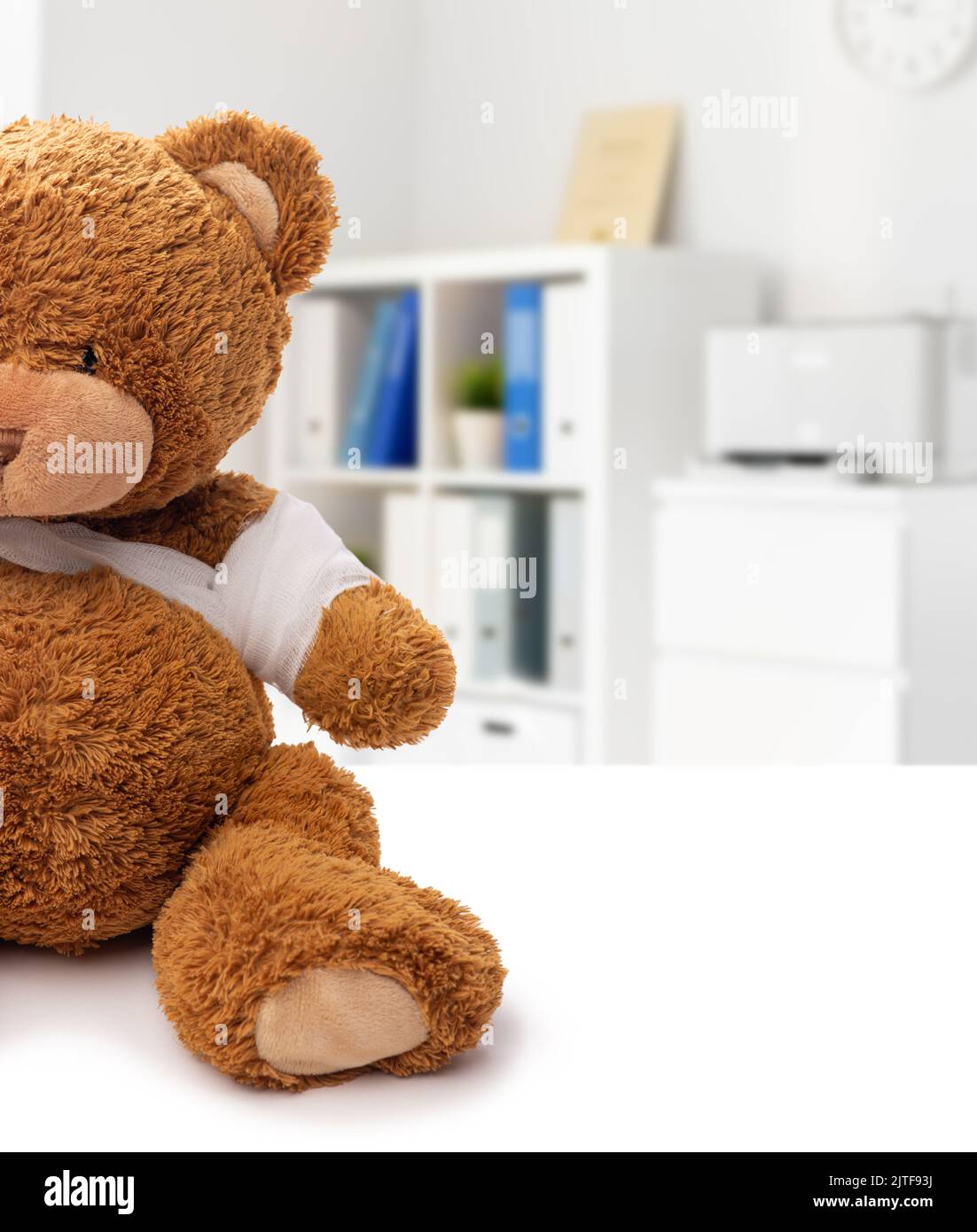 teddy bear toy with bandaged paw Stock Photo - Alamy
