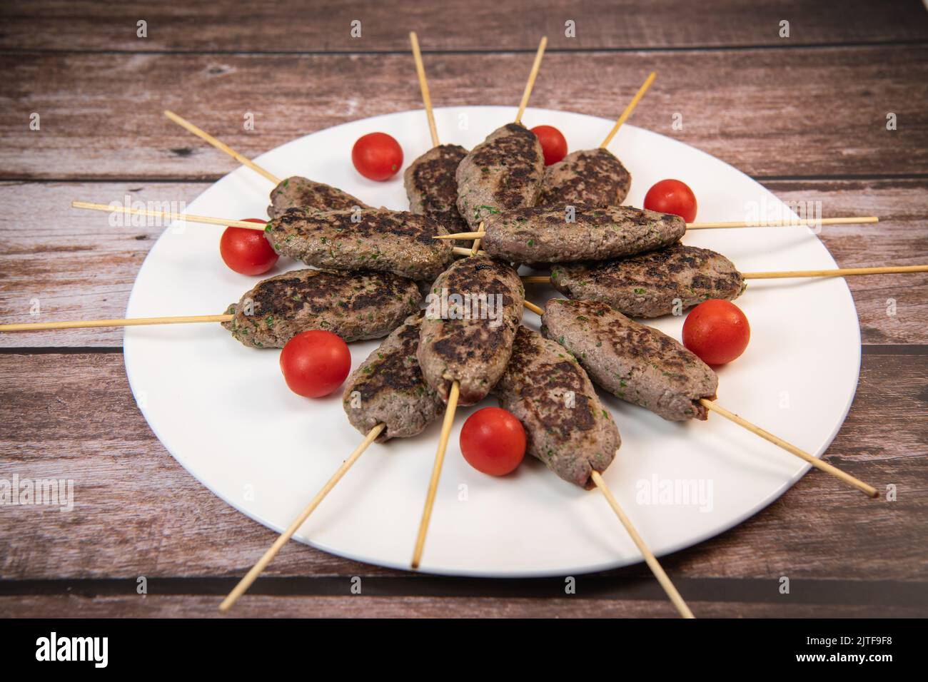 Recipe of kefta, beef skewer, Traditional homemade, with small tomatoes ...