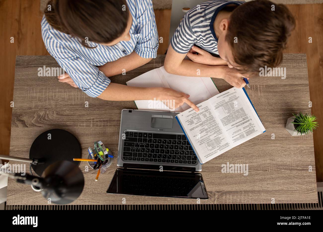 mother and son doing homework together Stock Photo - Alamy