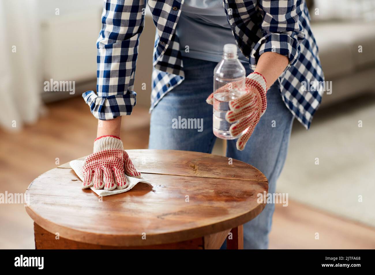 woman degreasing old table surface with solvent Stock Photo - Alamy