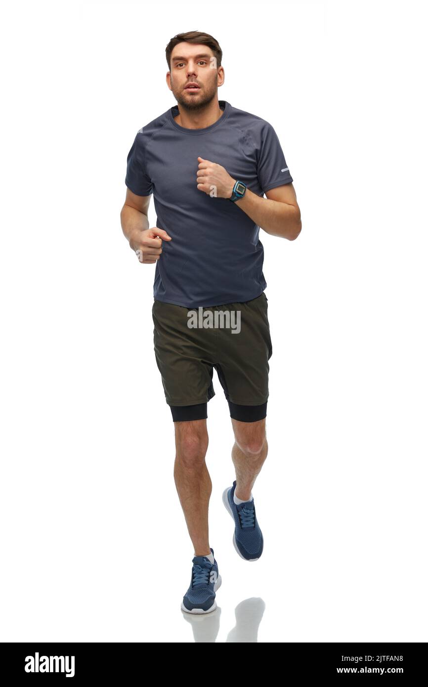 running man in sports clothes with smart watch Stock Photo - Alamy