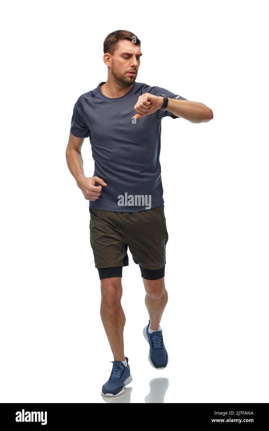 running man in sports clothes with smart watch Stock Photo - Alamy