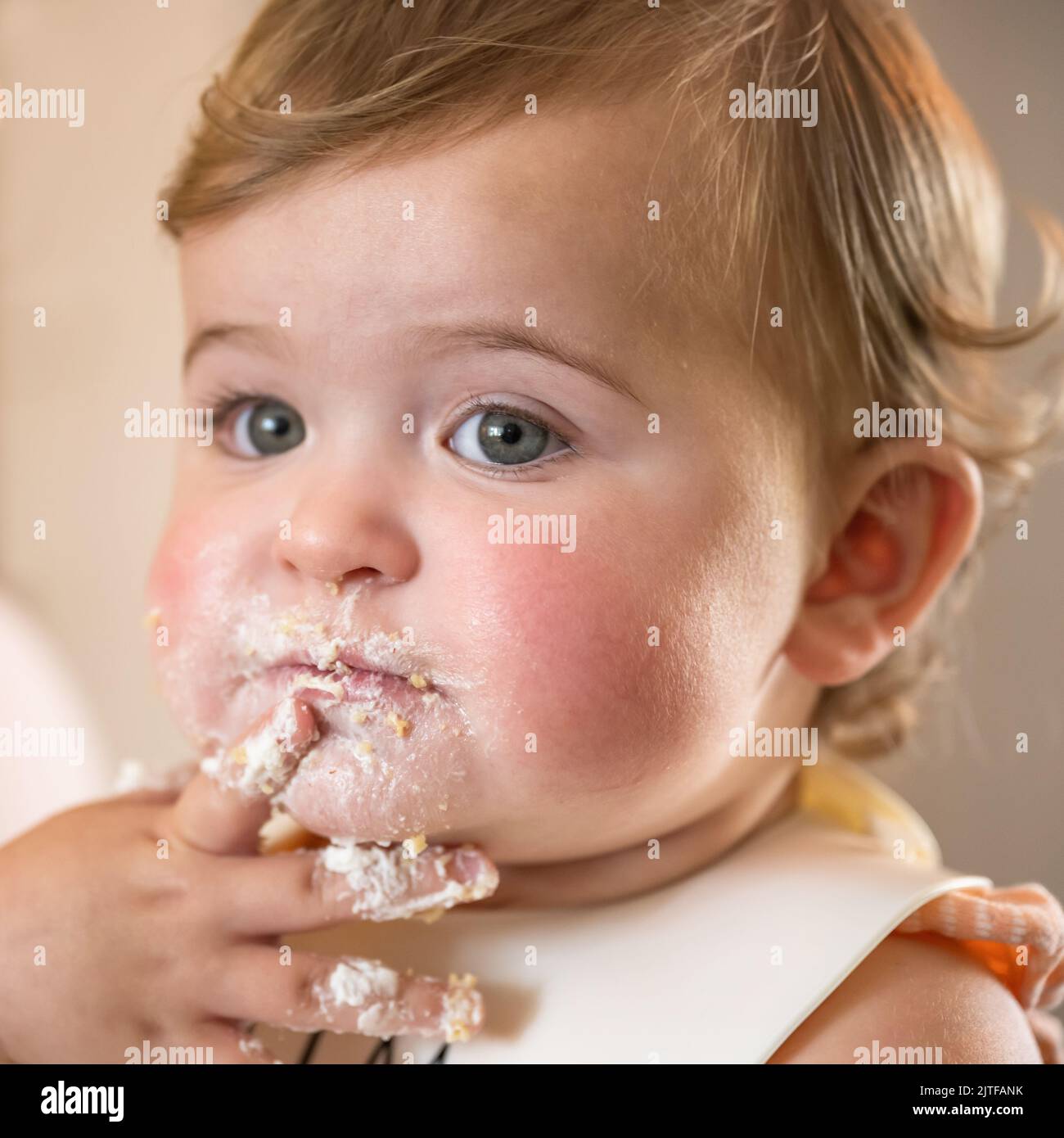 Blond girl and blue cake hi-res stock photography and images - Alamy