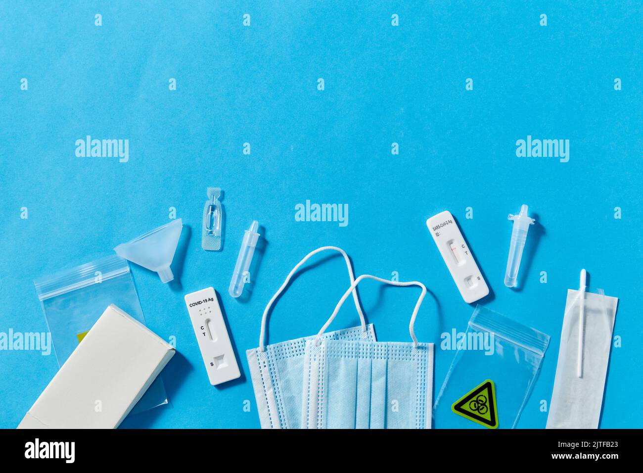 coronavirus self testing kits on blue background Stock Photo - Alamy