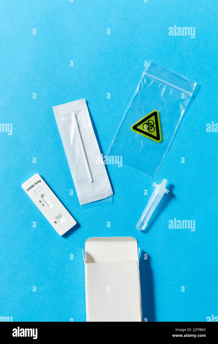 coronavirus nasal self testing kit on blue Stock Photo - Alamy