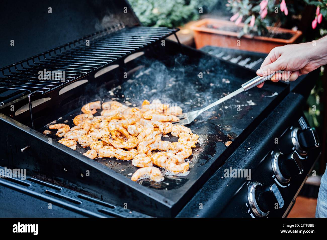 Grilling shrimp on skewer on outdoor grill. Grilled shrimps on the ...