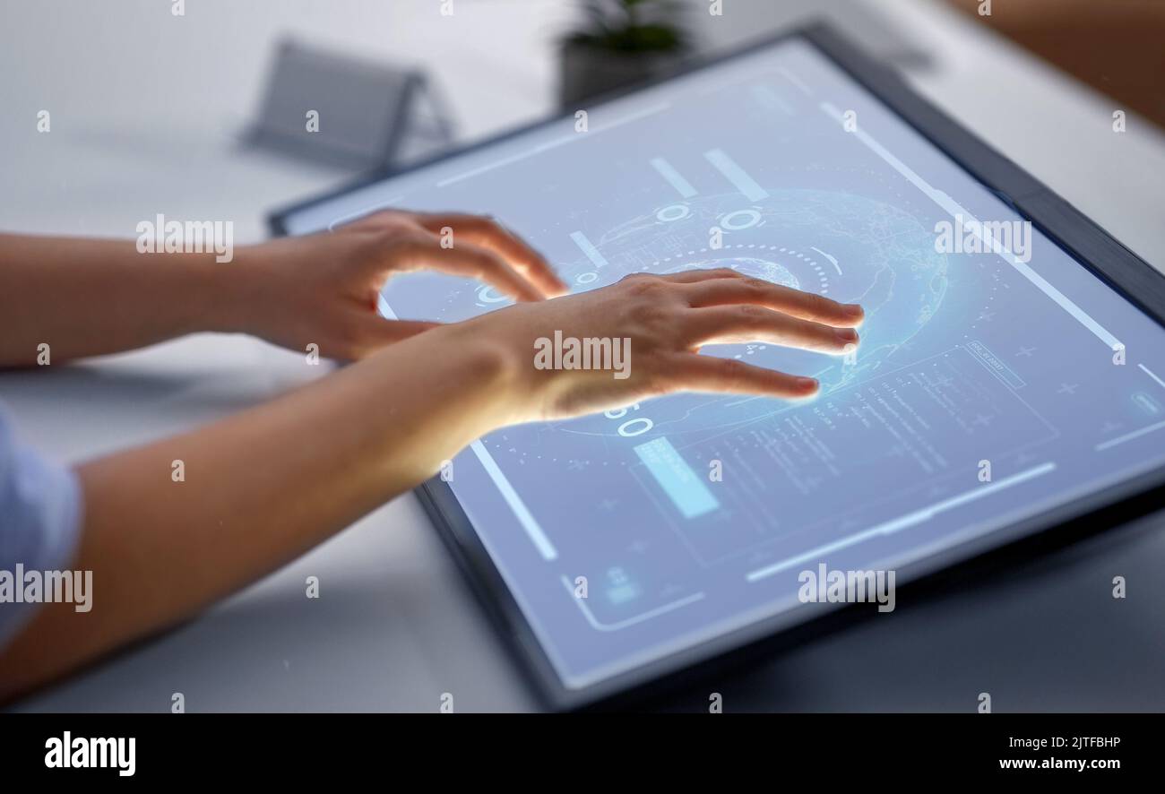 hands on led light tablet at office Stock Photo - Alamy