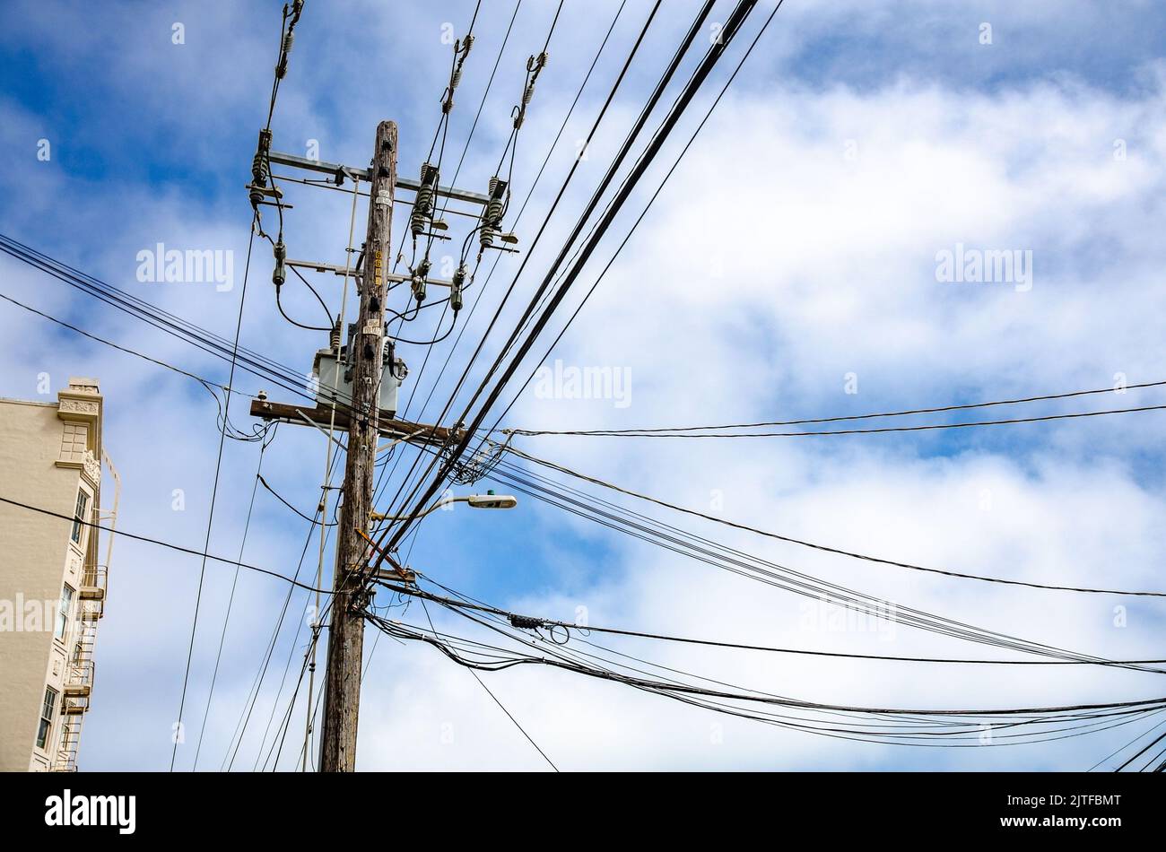 Overhead power cables on a street in San Francisco, California seen ...