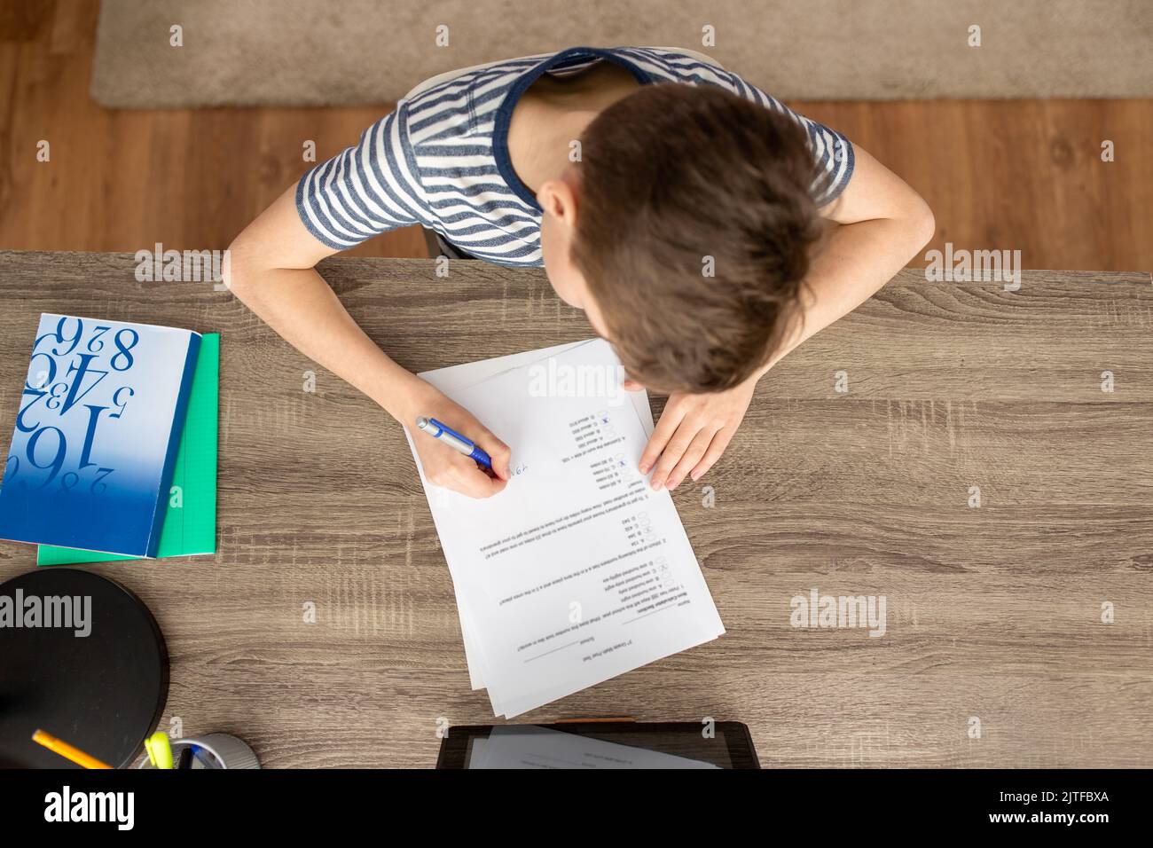 Child doing test hi-res stock photography and images - Alamy