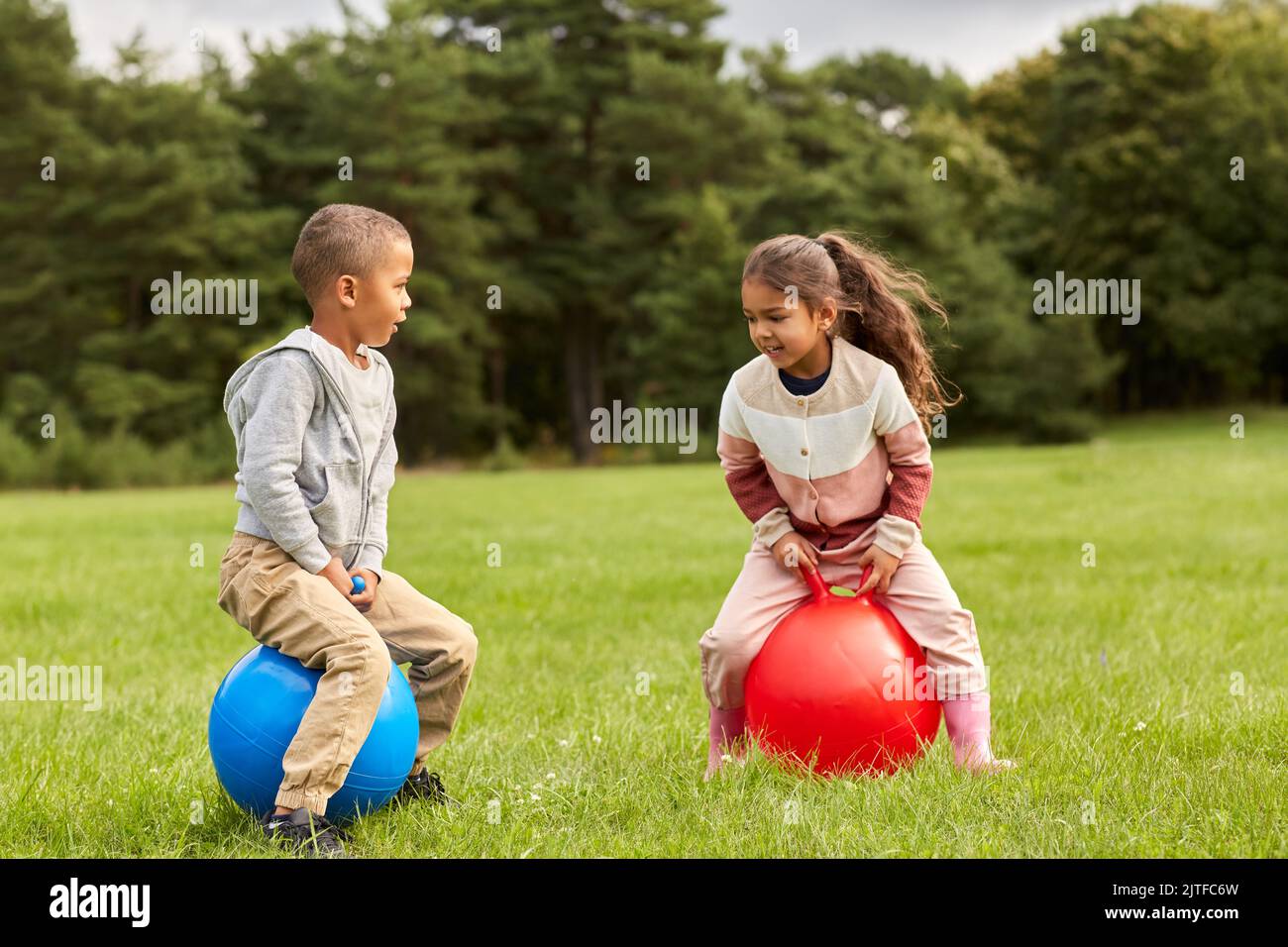 African girl jumping ball hi-res stock photography and images - Alamy