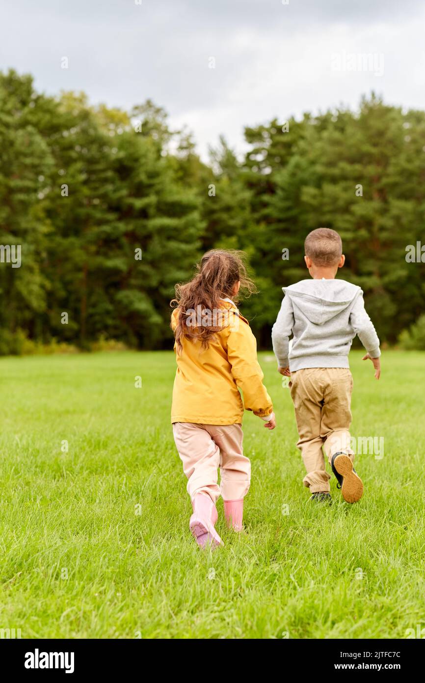 Child playing chasing hi-res stock photography and images - Alamy