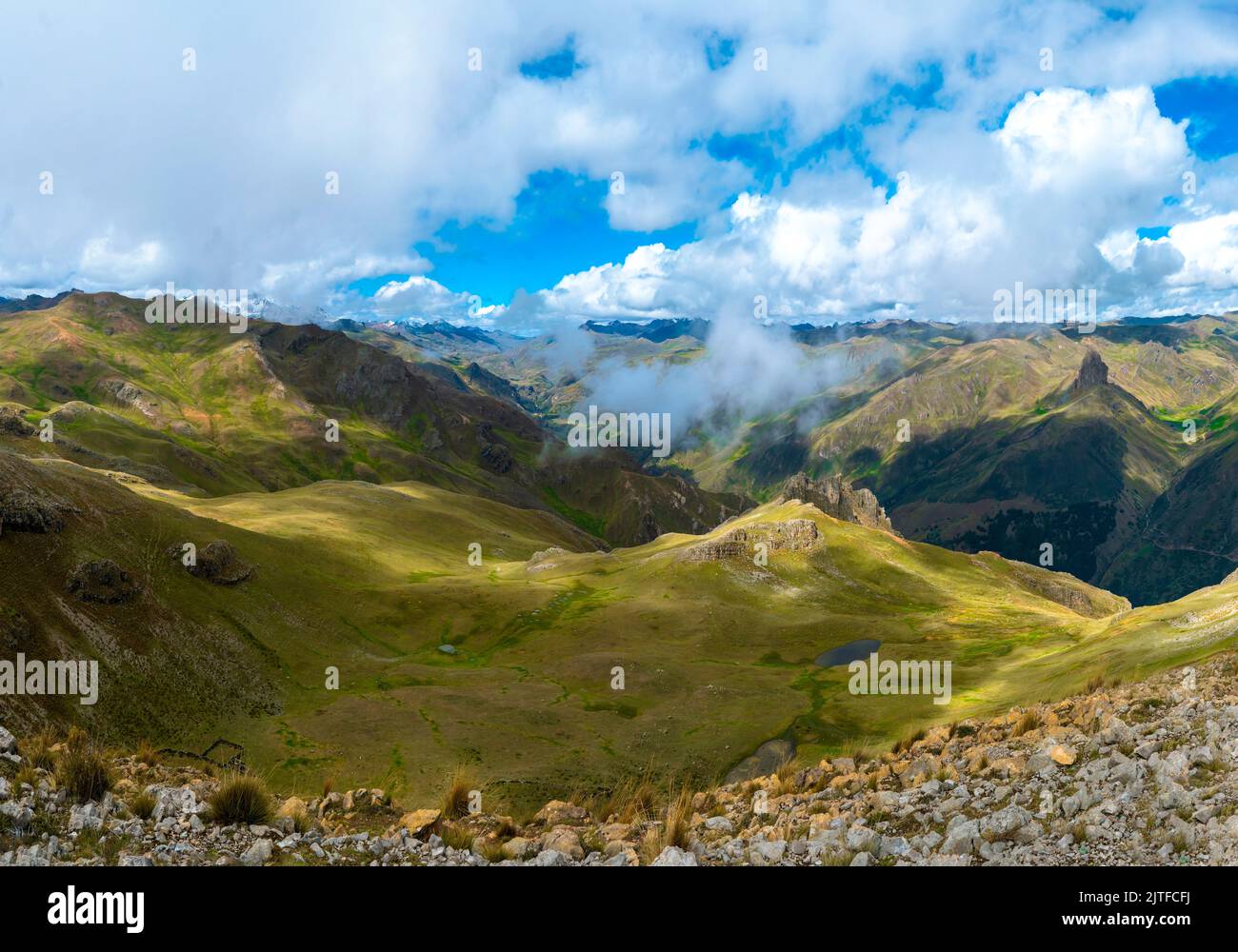 The hills in the Andes of Peru under the clouds in the blue sky Stock ...