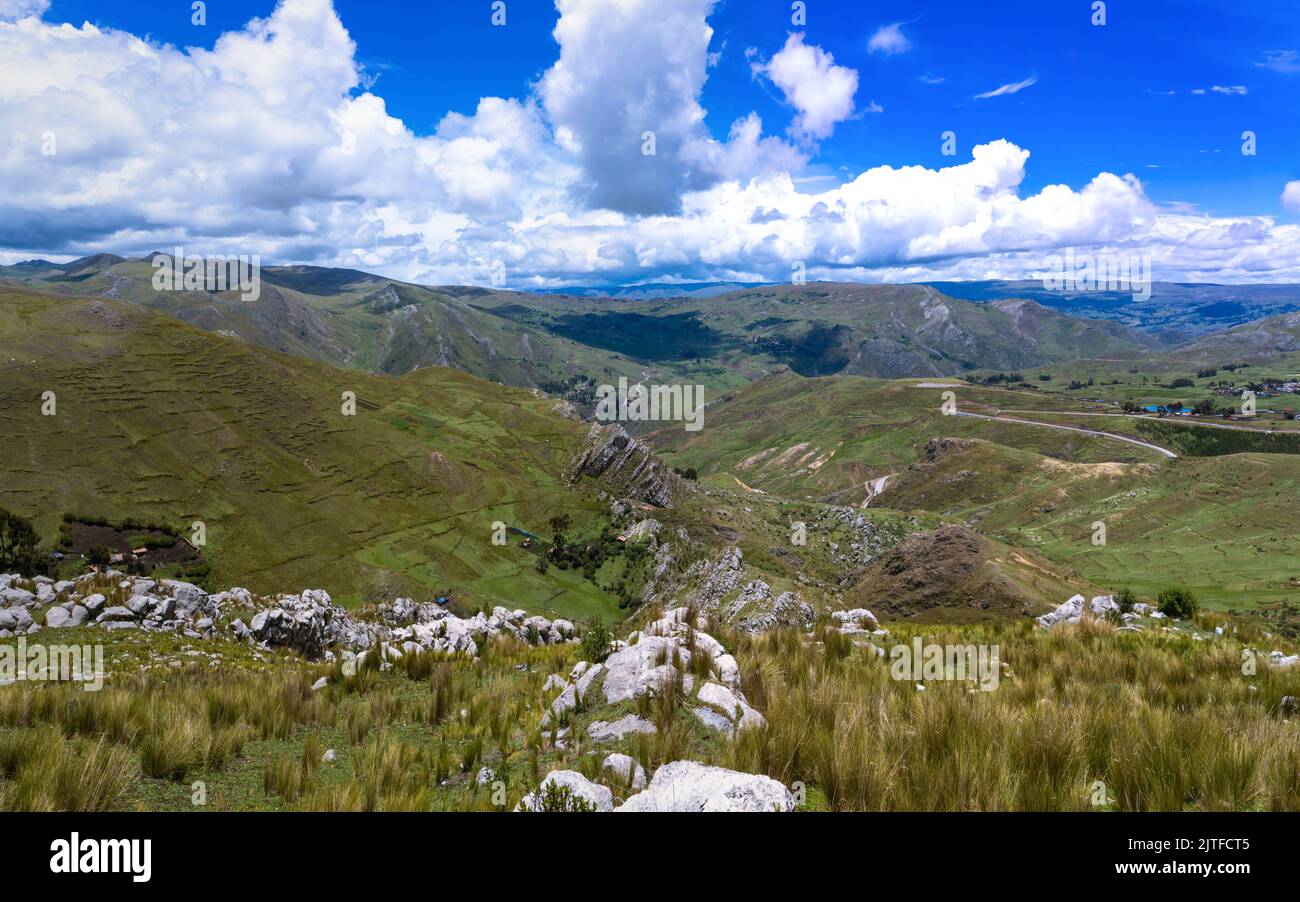 The hills in the Andes of Peru under the clouds in the blue sky Stock ...
