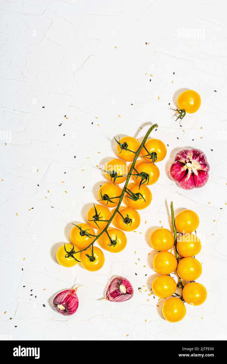 Culinary background with ripe vegetables. Yellow tomato cherries ...