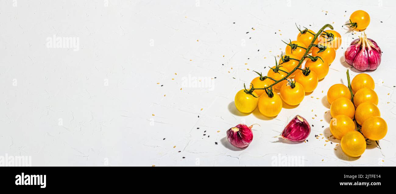 Culinary background with ripe vegetables. Yellow tomato cherries ...