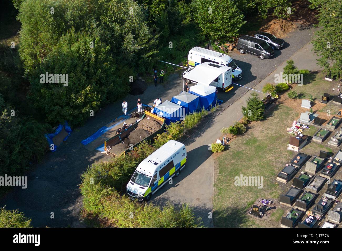 Crime tent graves cemetery hi-res stock photography and images - Alamy