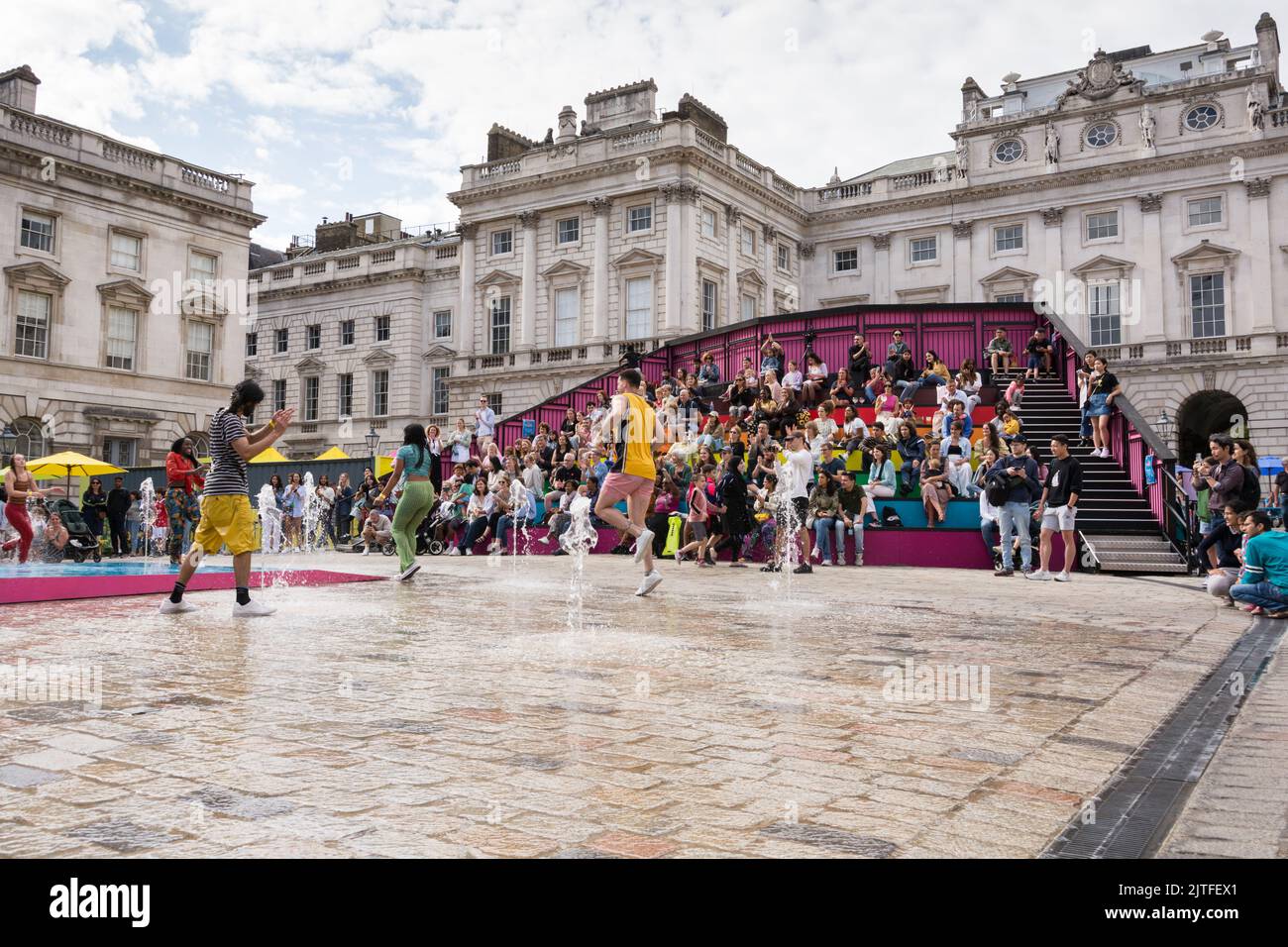 Spectators enjoying the This Bright Land performance in the ...
