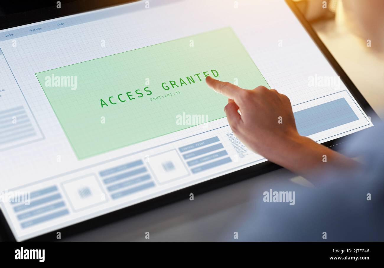 hand on led light tablet at night office Stock Photo - Alamy
