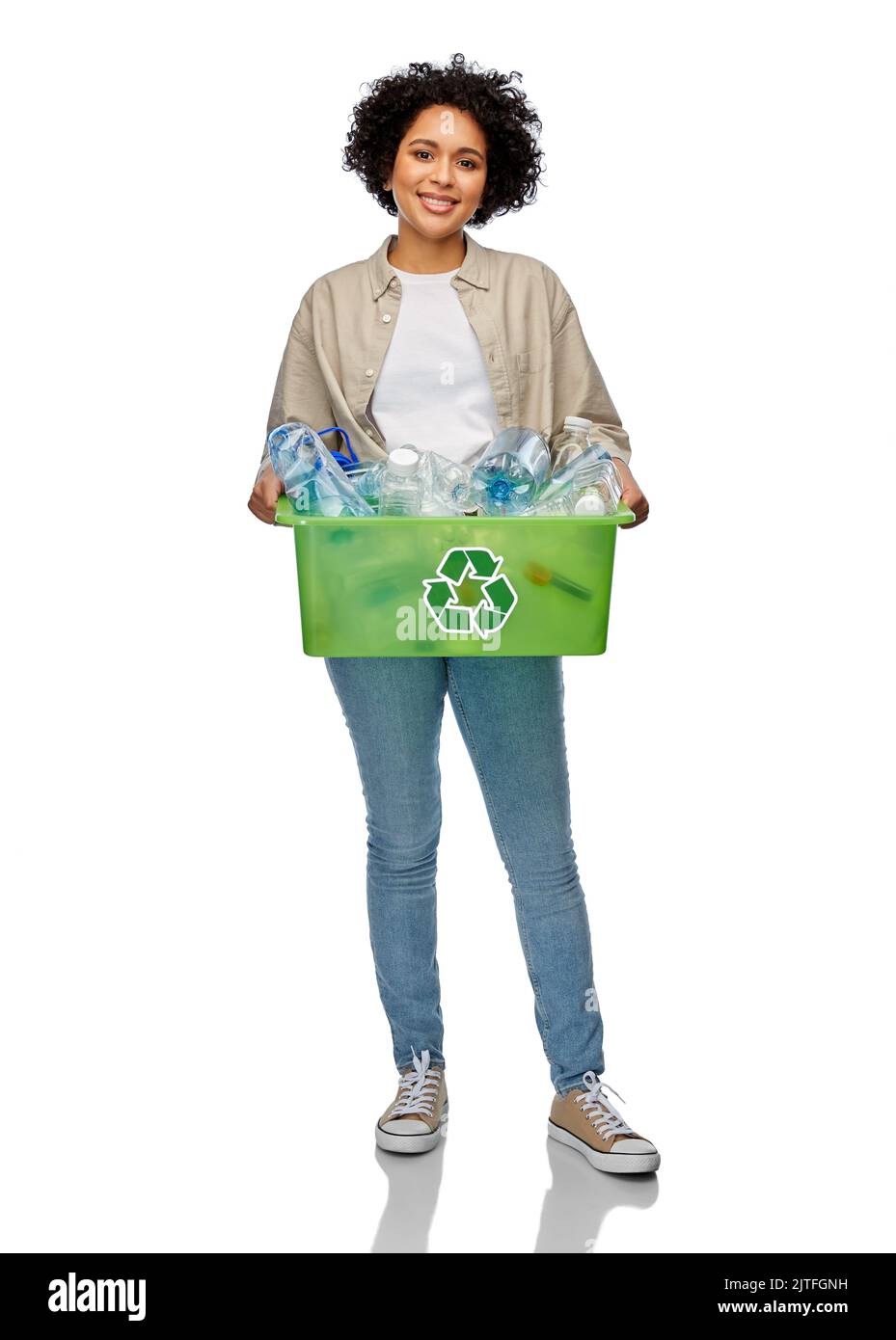 smiling woman sorting plastic waste Stock Photo - Alamy