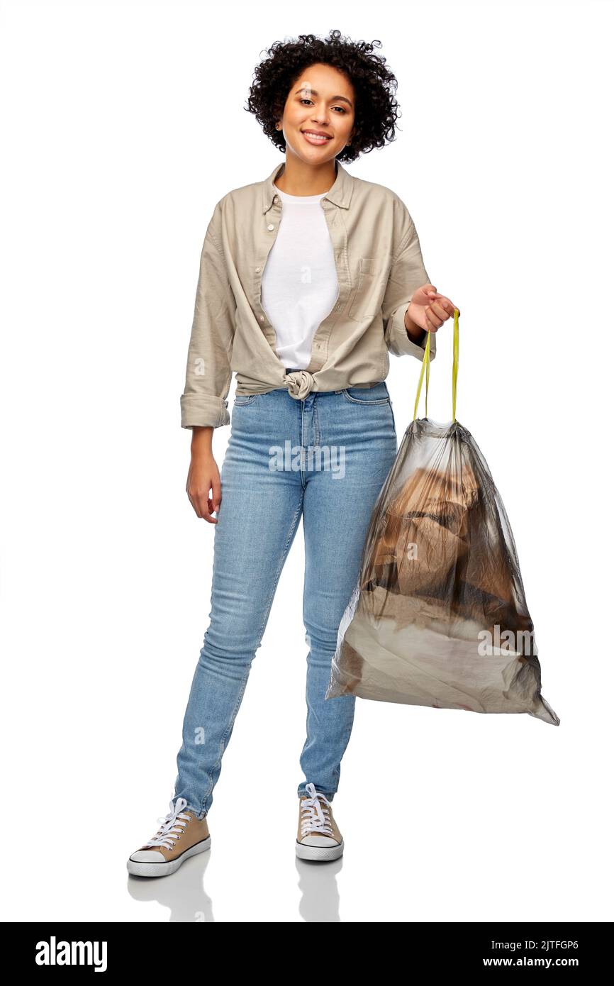 happy woman sorting paper waste Stock Photo - Alamy