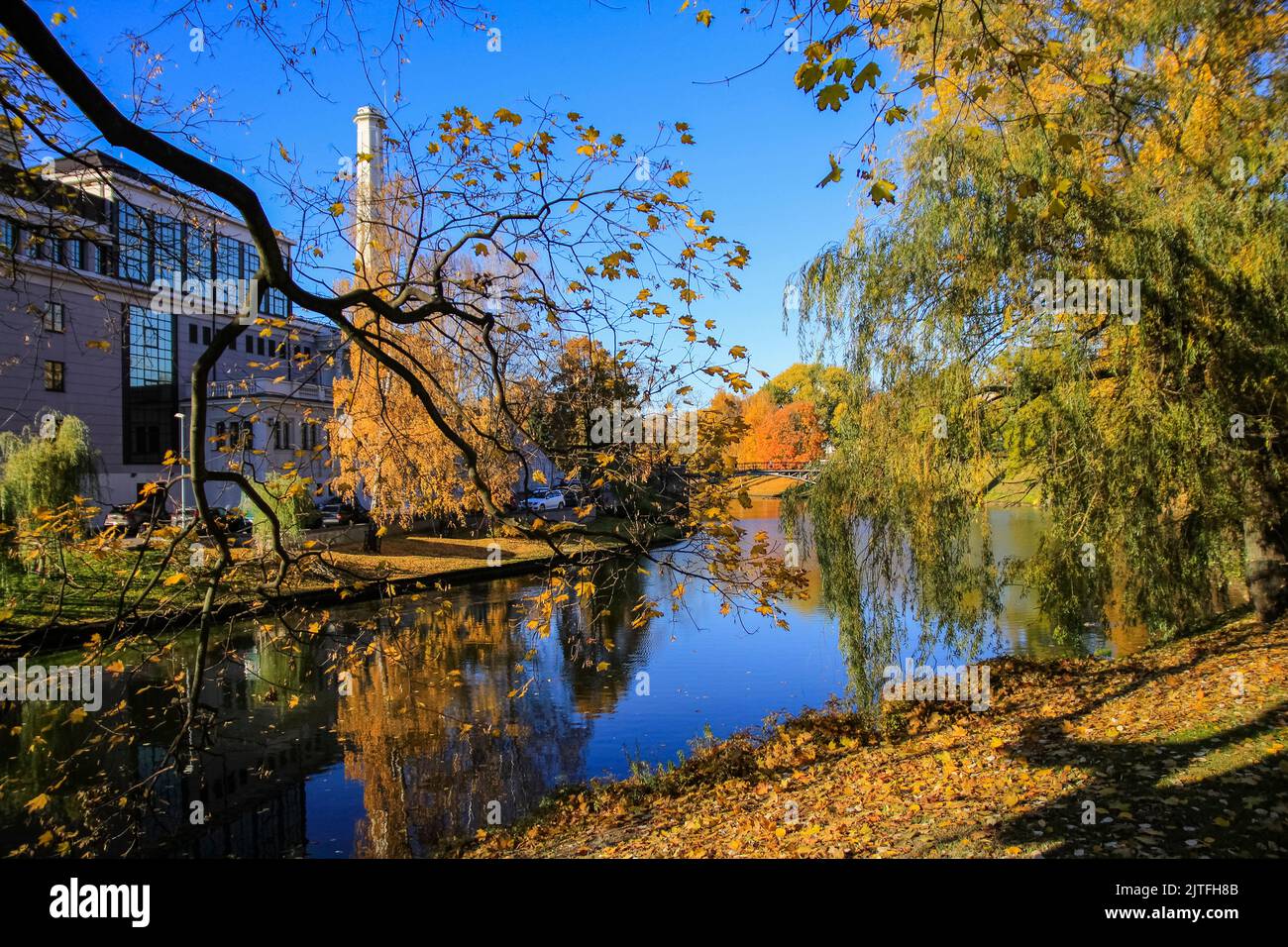 Indian summer in Riga, the capital of Latvia. View of the city channel ...