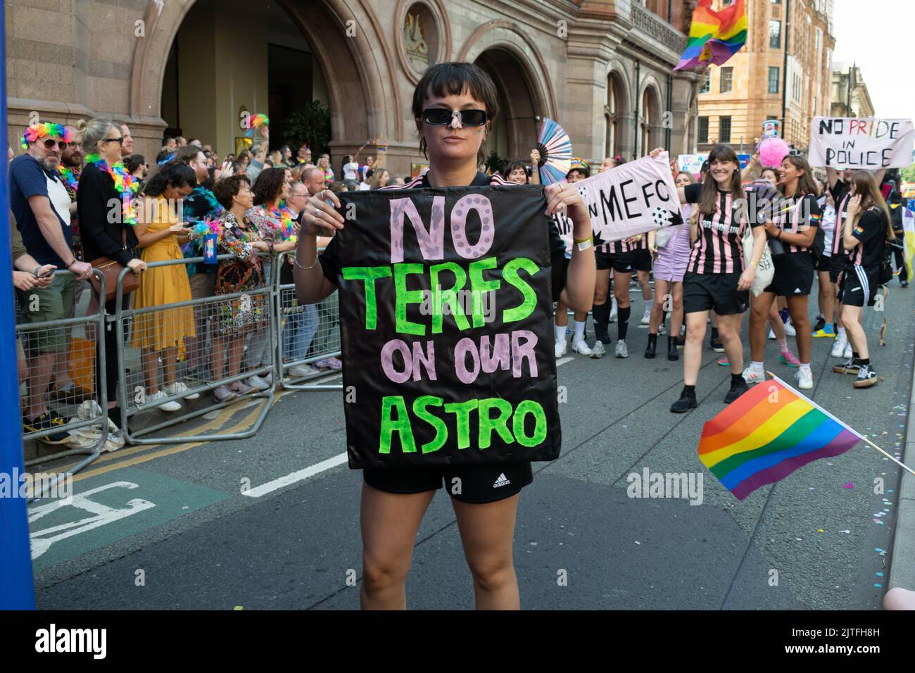 Manchester Pride parade. Woman with sign text No Terfs on our Astro ...