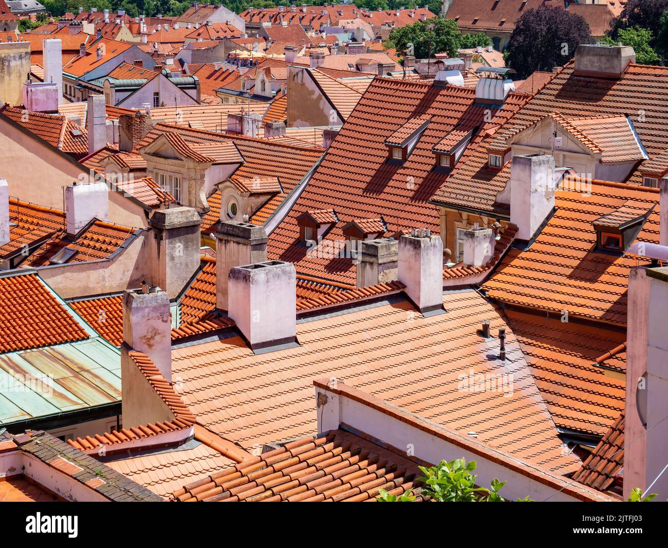 View with the red brick roofs of the old houses in the old town of ...