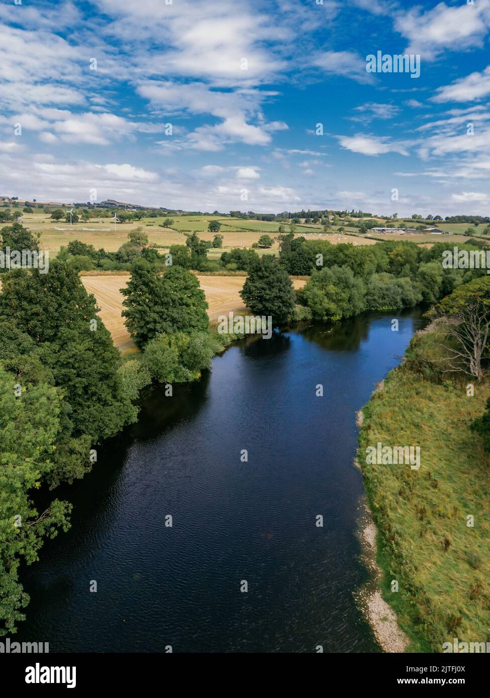 A vertical shot, aerial view of the River Wharfe in the Wharfe Valley ...