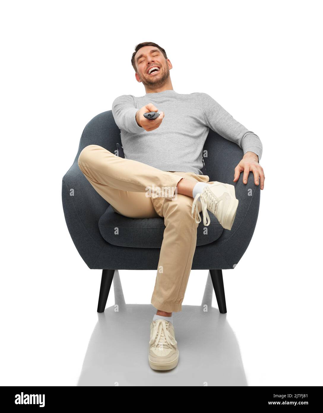 Laughing at tv hi-res stock photography and images - Alamy