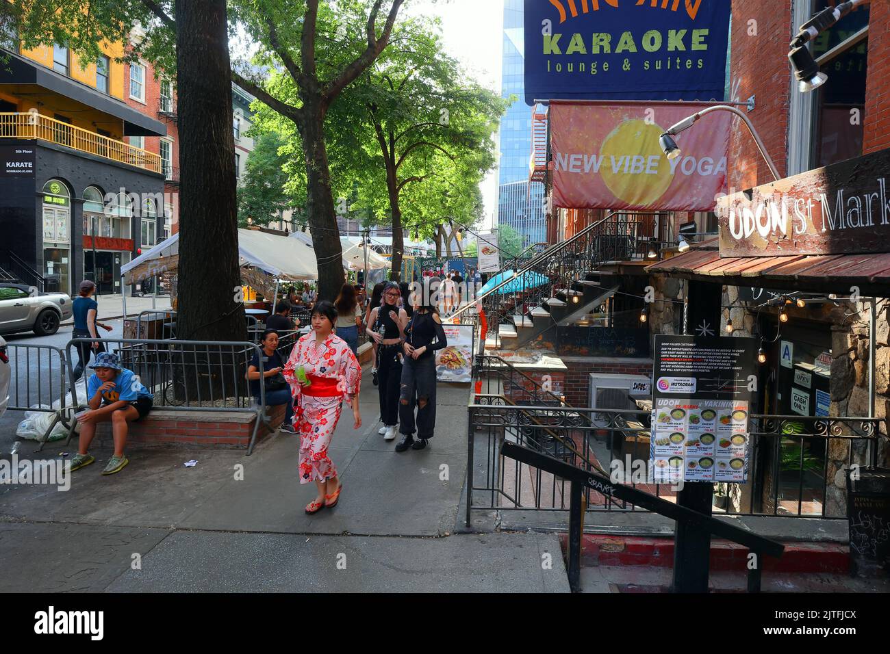 Asian Americans walking along St. Marks Pl in Manhattan's "Little Tokyo ...