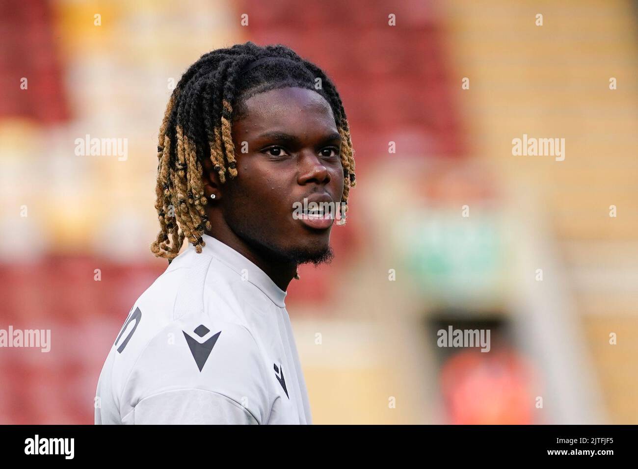 Alex Mighten of Sheffield Wednesday inspects the pitch before the game ...