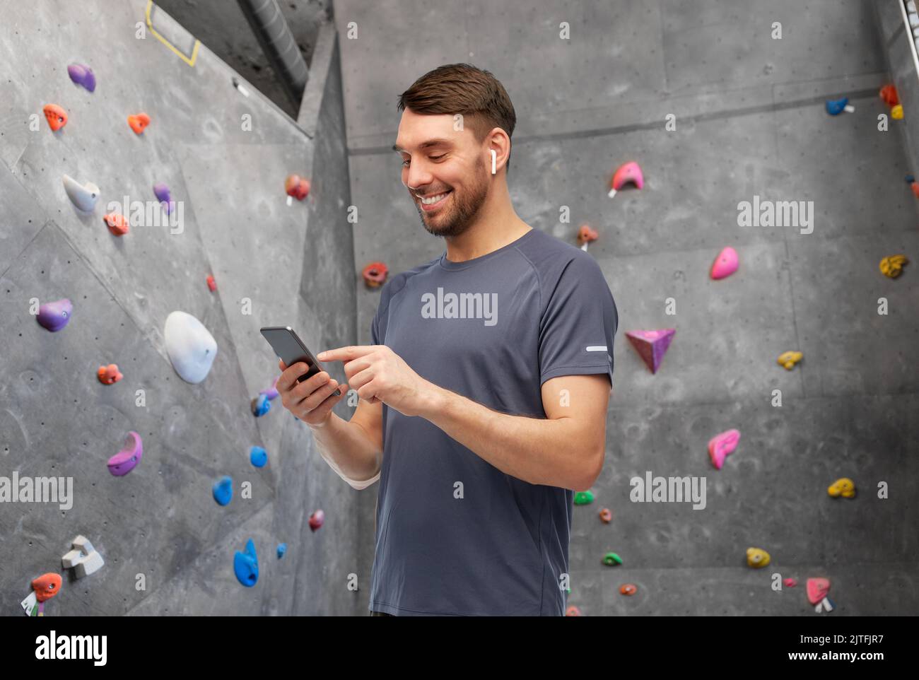 Person climbing over wall hi-res stock photography and images - Alamy