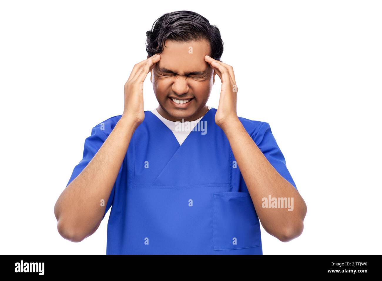 stressed doctor or male nurse having headache Stock Photo - Alamy
