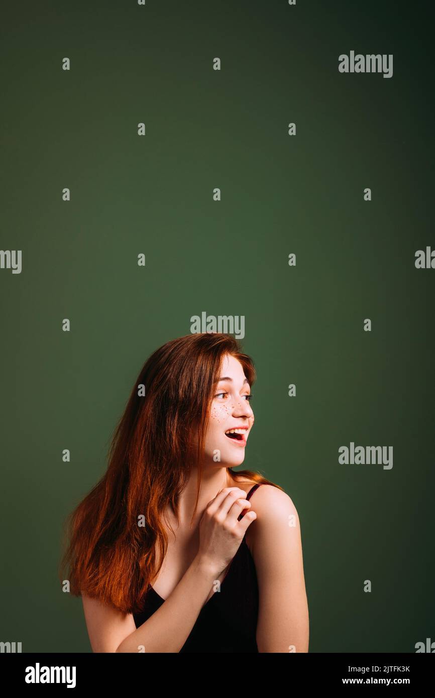 hope redhead woman looking sideways open mouth Stock Photo - Alamy