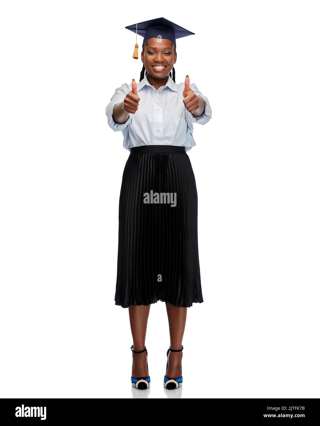 happy female graduate student showing thumbs up Stock Photo - Alamy