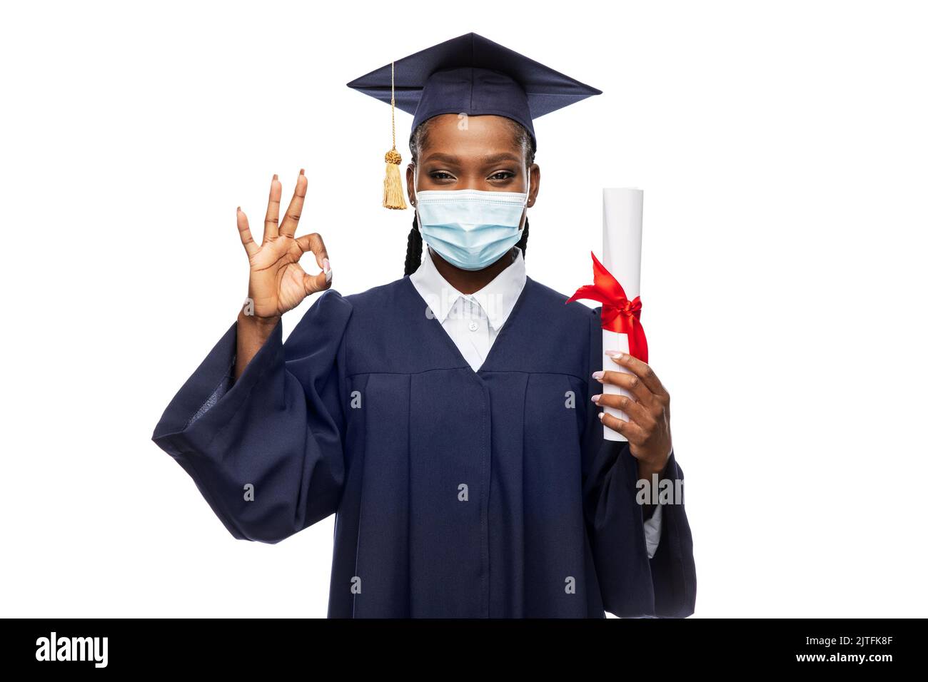 female graduate student in mask with diploma Stock Photo - Alamy