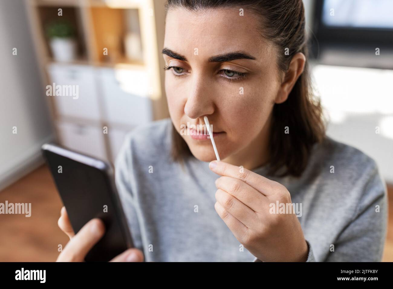 Woman making self testing hi-res stock photography and images - Alamy