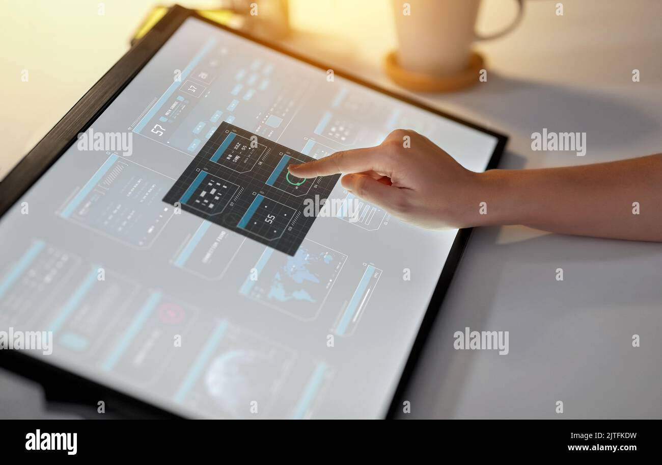 hand on led light tablet at night office Stock Photo - Alamy